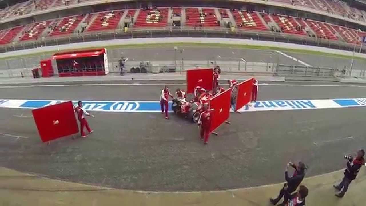 F1 Testing - Ferrari all secretive with Kimi in the pit lane - Circuit ...