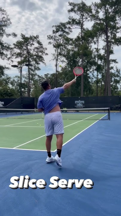 The tennis slice serve- relaxed and wrist snap - YouTube