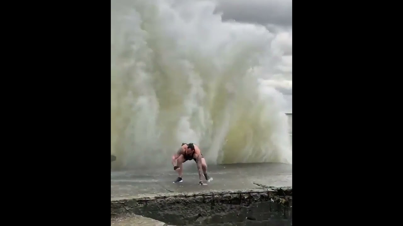 Bodybuilder Gets Washed Away By Huge Wave While Stretching on Pier ...