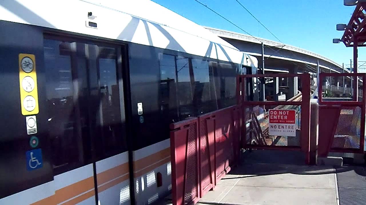 LA Metro Rail Green Line Train Arriving at Aviation Station - YouTube