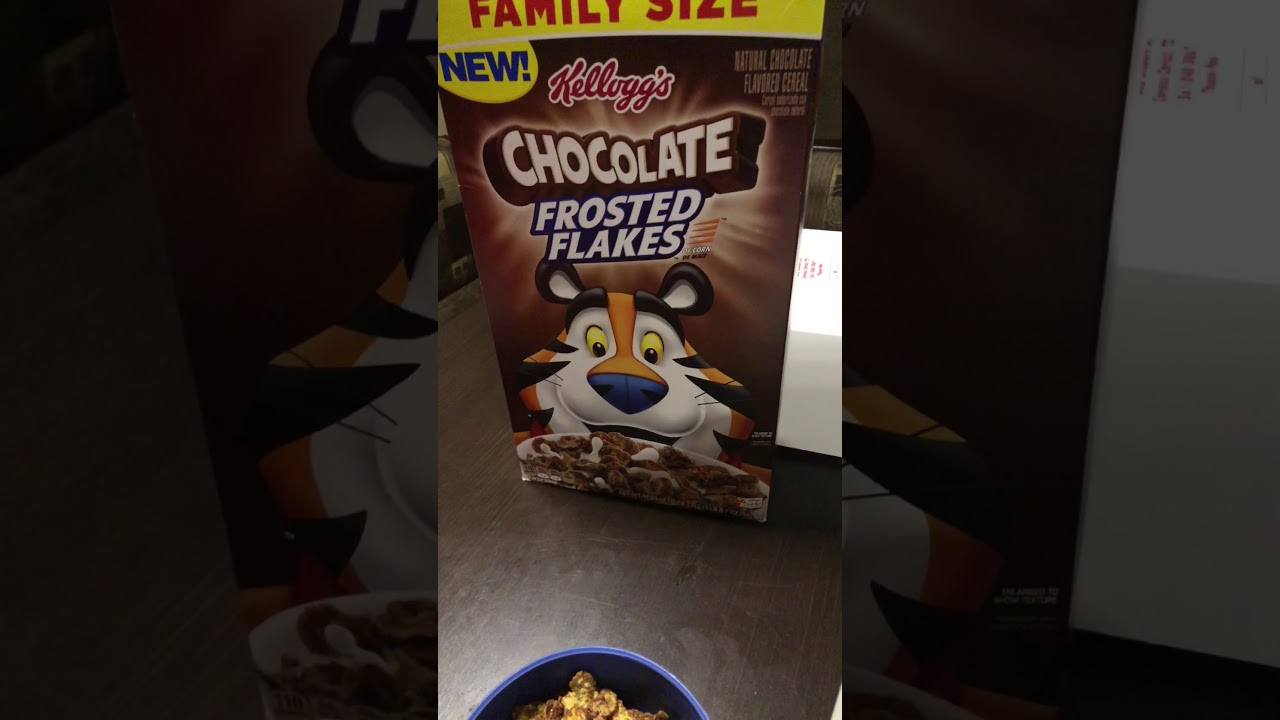 Trying the new chocolate Frosted Flakes - YouTube