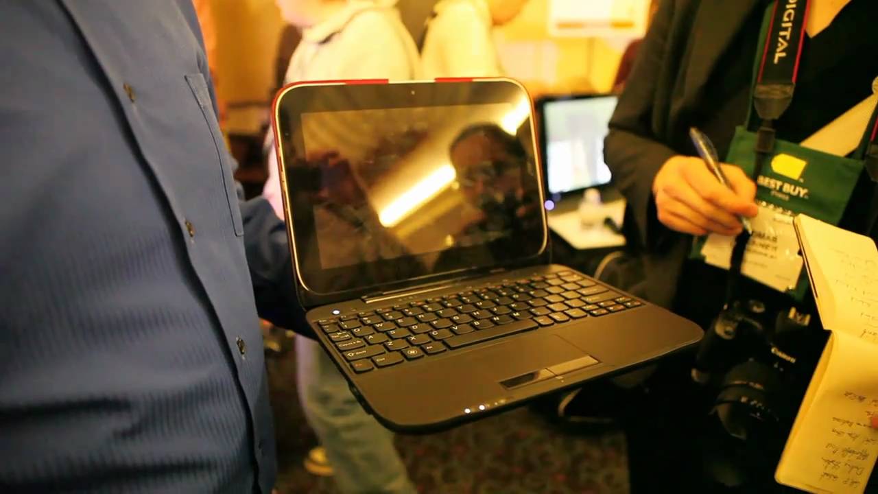 Lenovo shows off the IdeaPad U1 Hybrid at CES 2011 - YouTube