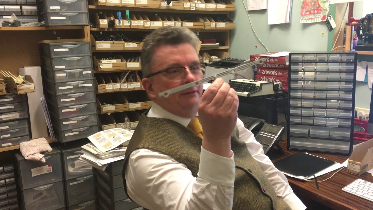 Brother 1034D Overlocker Mast Top Thread Guide - YouTube