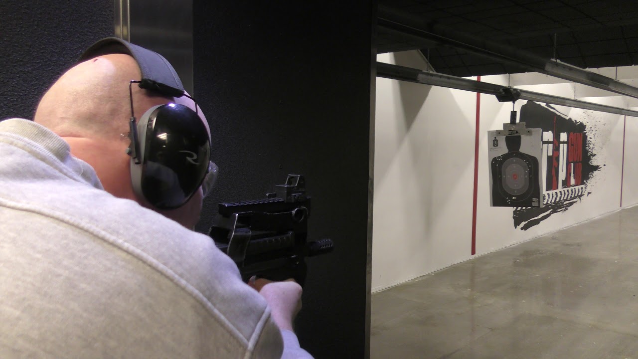 Firing the FN P90 in semi auto and full auto - YouTube