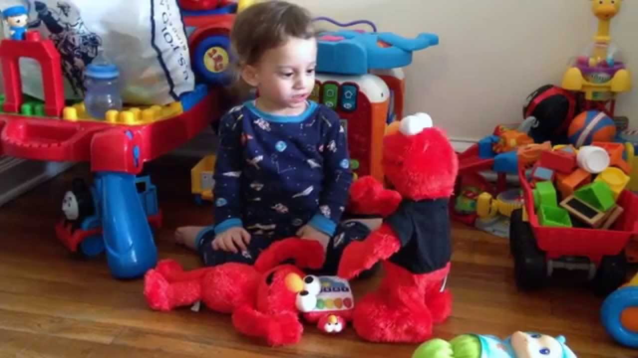 baby playing with elmo - YouTube