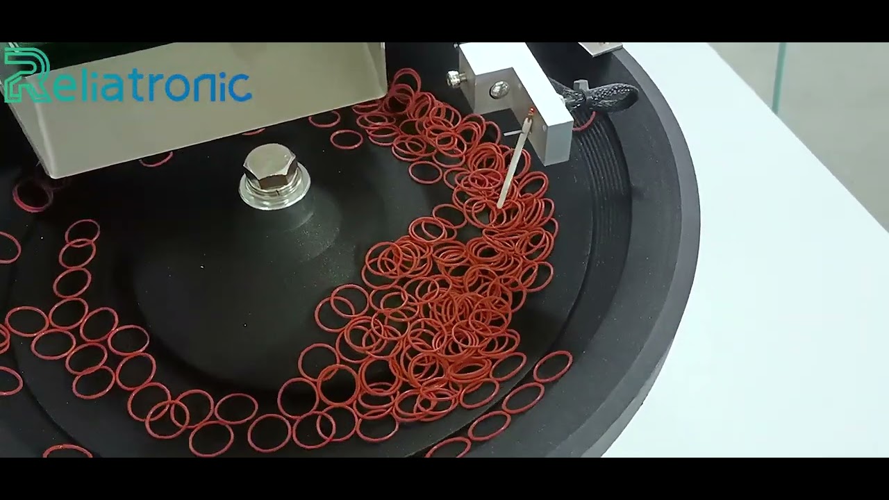 O ring feeder with dispenser - YouTube