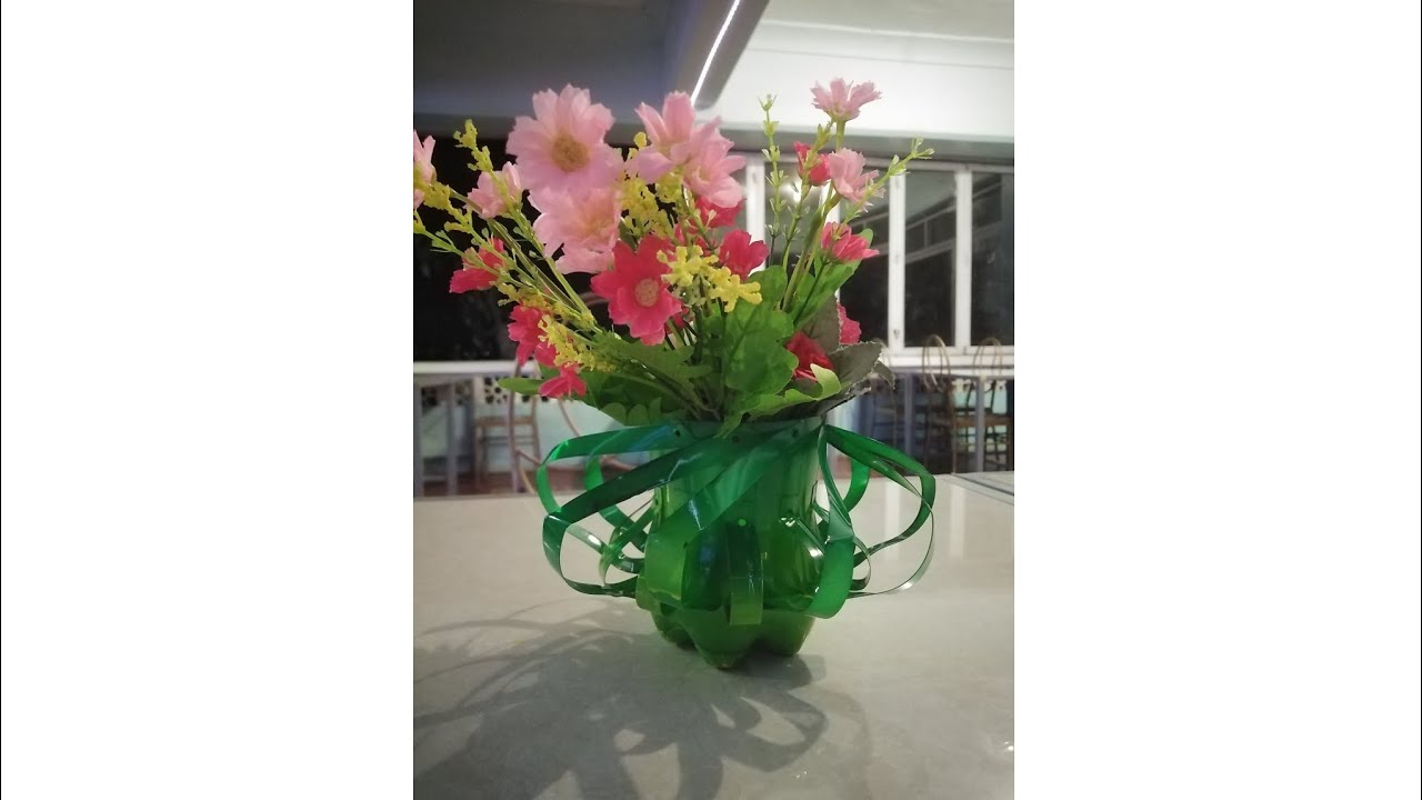 different design of planter/flower base using 1litter Coke Plastic ...