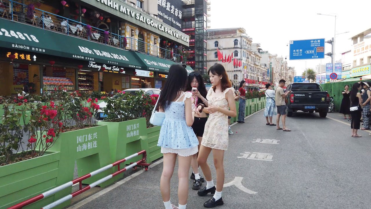 4K The Chinese border city of Dongxing, bordering Vietnam.Bicycle Tour ...