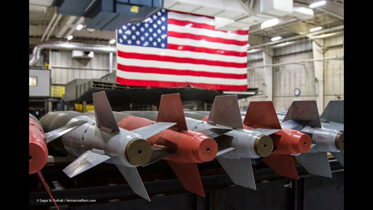 Loading JDAM bombs onto a B-2 Stealth Bomber - YouTube