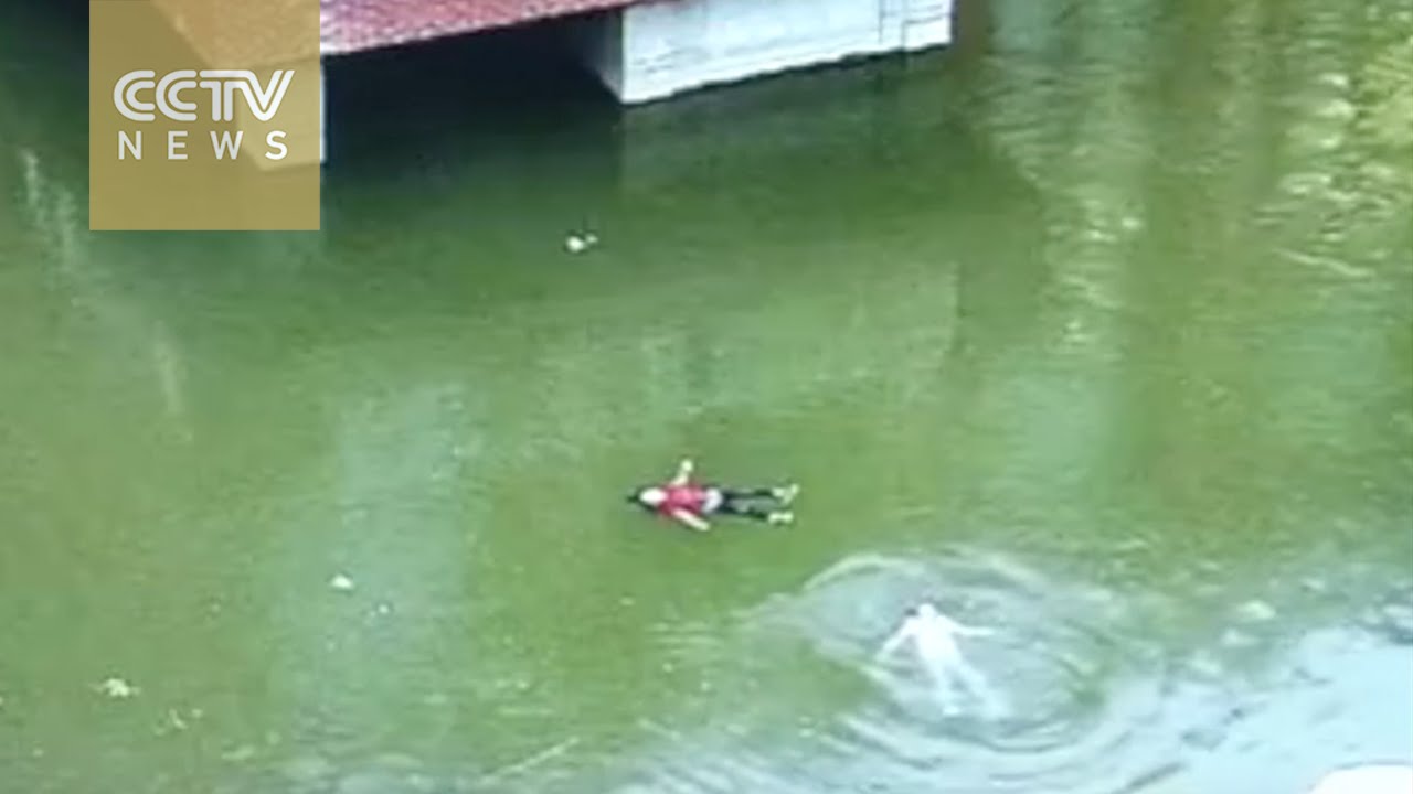 Footage: Children saved from pond after struggling for two minutes in ...