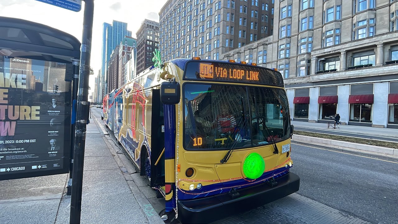 CTA Allstate Holiday Bus Action Across Chicago - YouTube