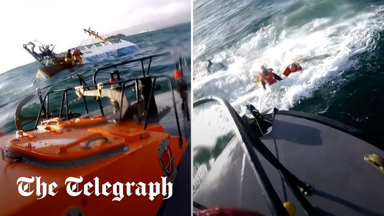 Crew members jump off sinking ship and swim for their lives in dramatic rescue video - YouTube