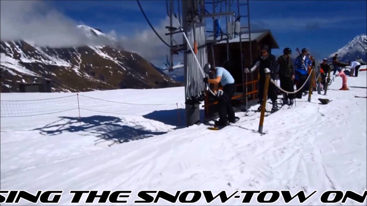 How to ride a surface lift on a snowboard - YouTube