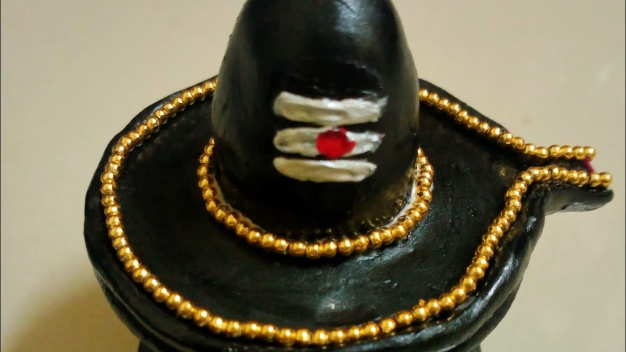 ప్రమిదలతో శివలింగం || shivling with diya || shivling making with diya ...