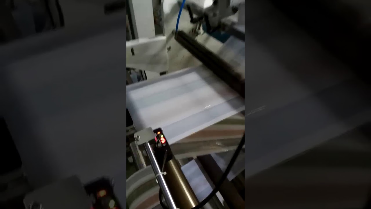 Argus Laser cut easy tear line on flexible packaging film - YouTube