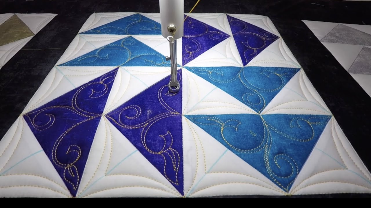 Quilting a Ribbon Curl Motif in Triangles - YouTube