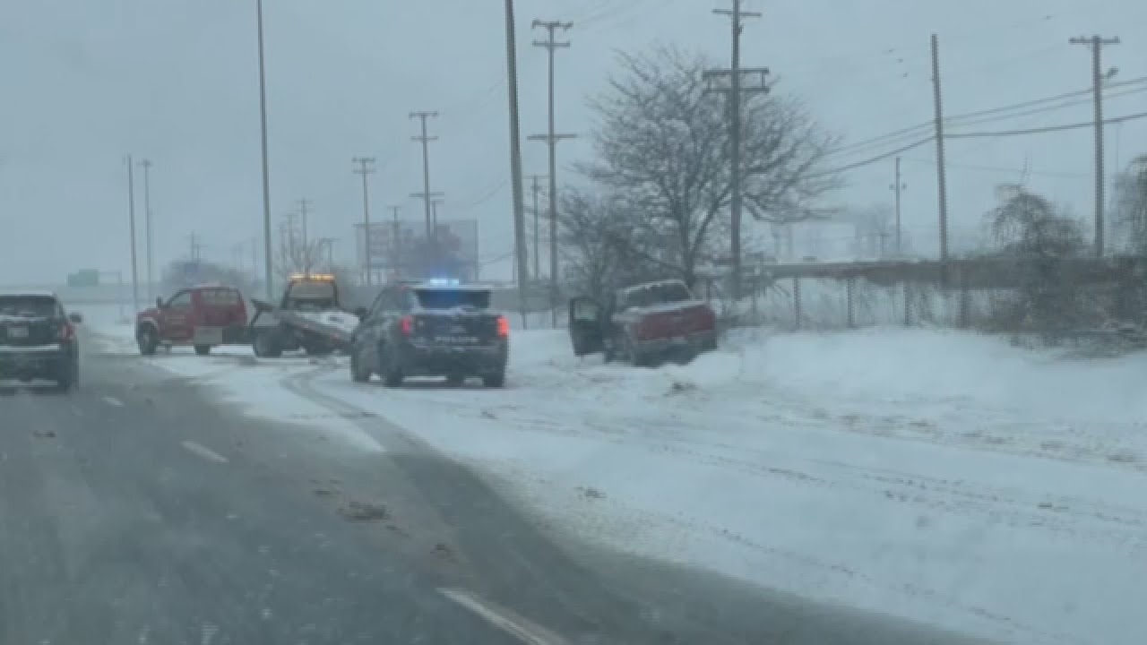 Pickup truck slides off the road from snowy conditions on I-90 in ...