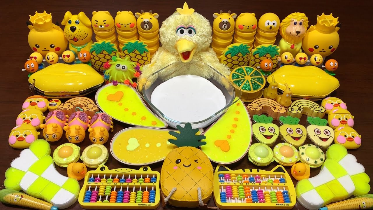 YELLOW SLIME - Mixing Random Things Into Glossy Slime !! Satisfying ...