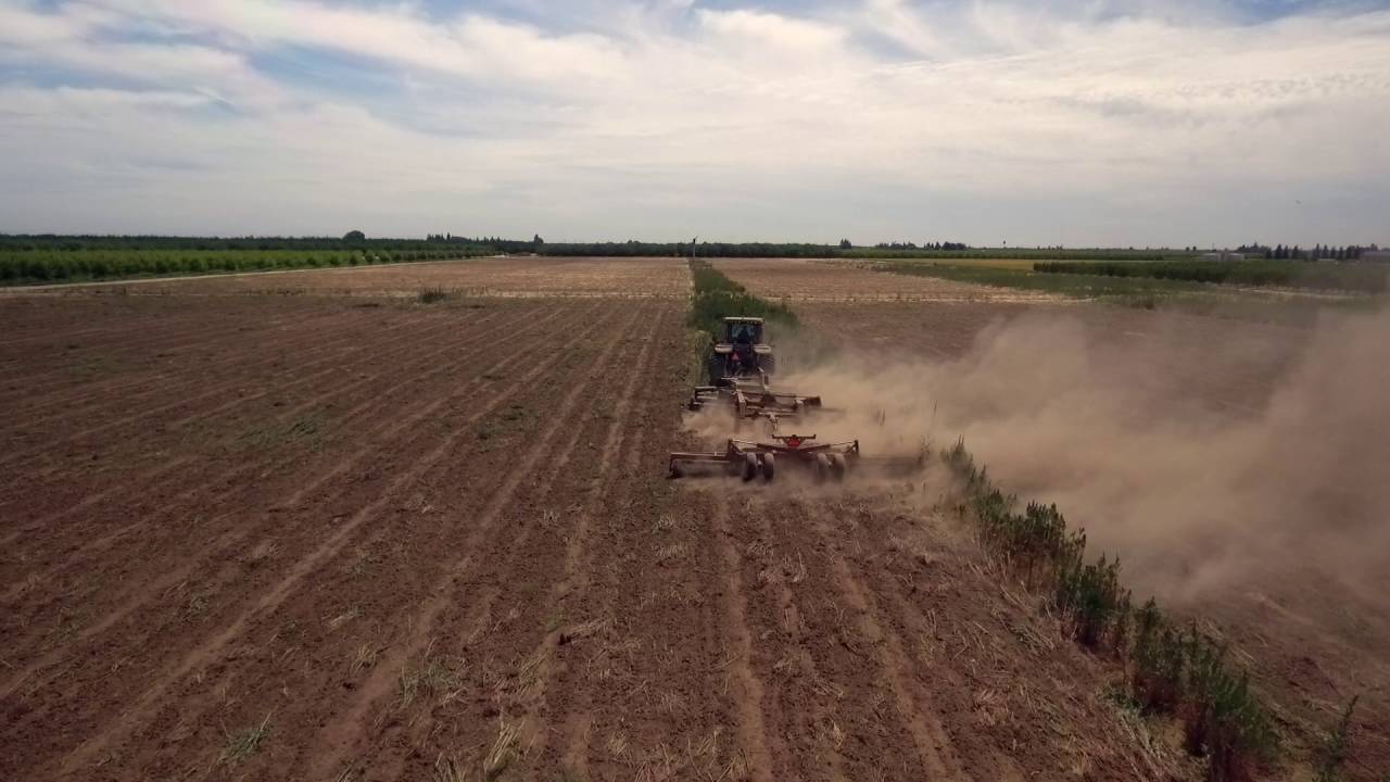 Disking Field in Preparation of Almond Planting - YouTube