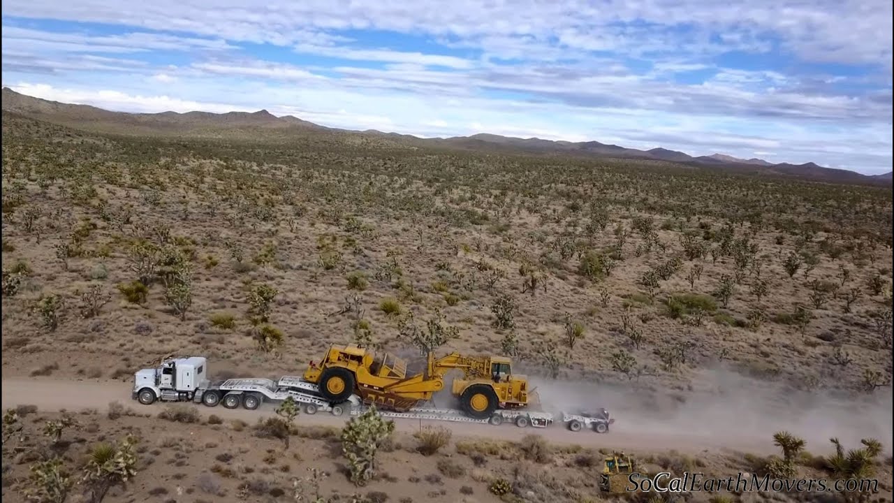 Delivering a CATERPILLAR 657E scraper to the middle of nowhere - YouTube