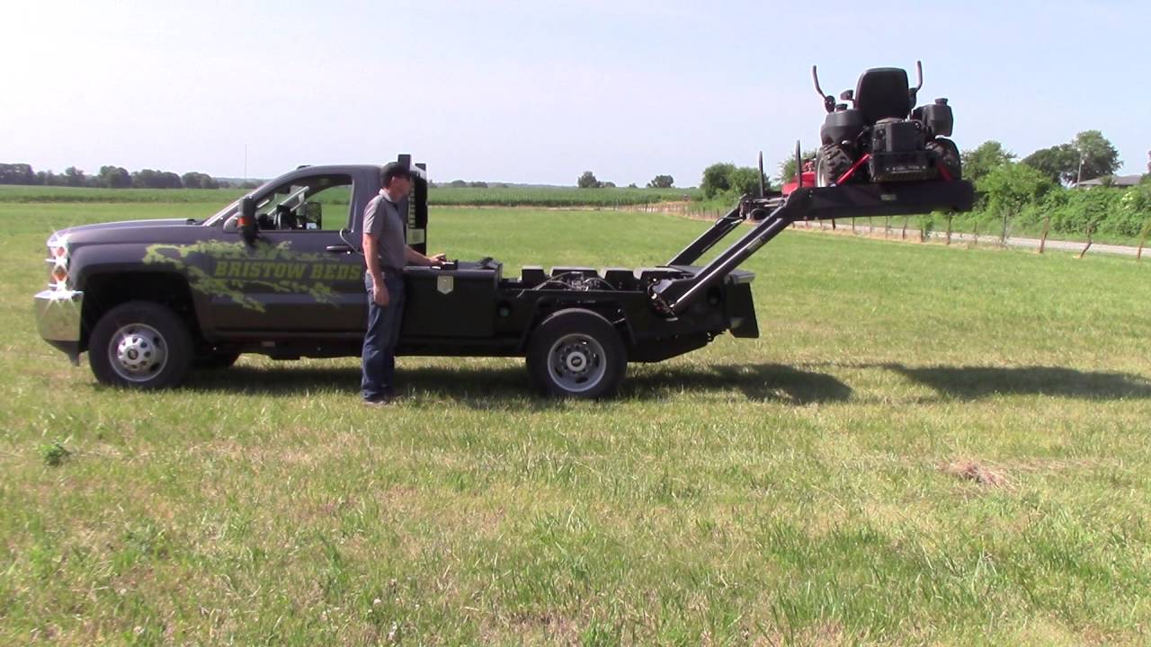 Landscaping | Unloading a Lawn Mower | Bristow Beds | Truck Forklift ...