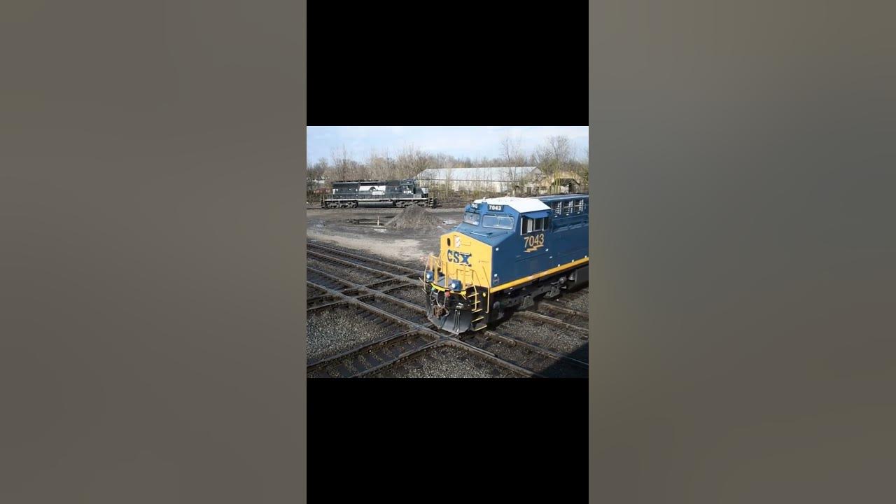 CSX slamming the diamonds In Marion Ohio, Ft. Tornado sirens and brand new CM44AC #train #csx ...