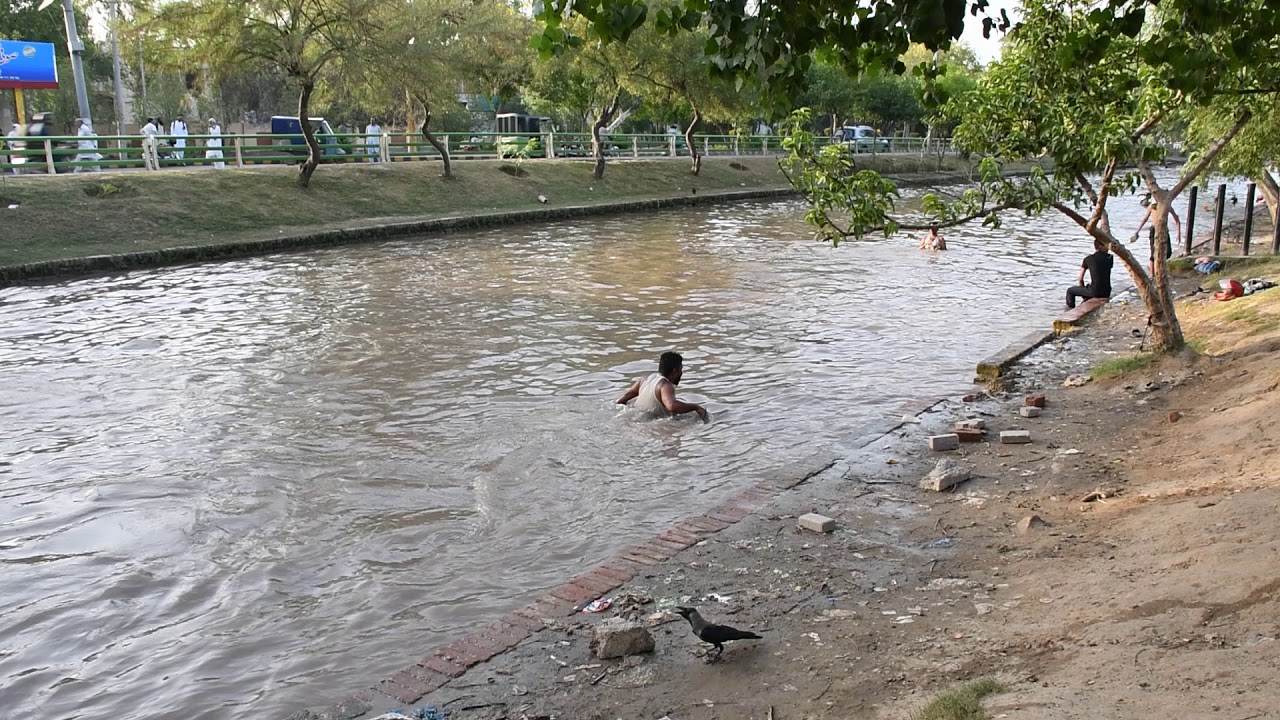 Lahore Canal is a poor man's swimming pool - YouTube