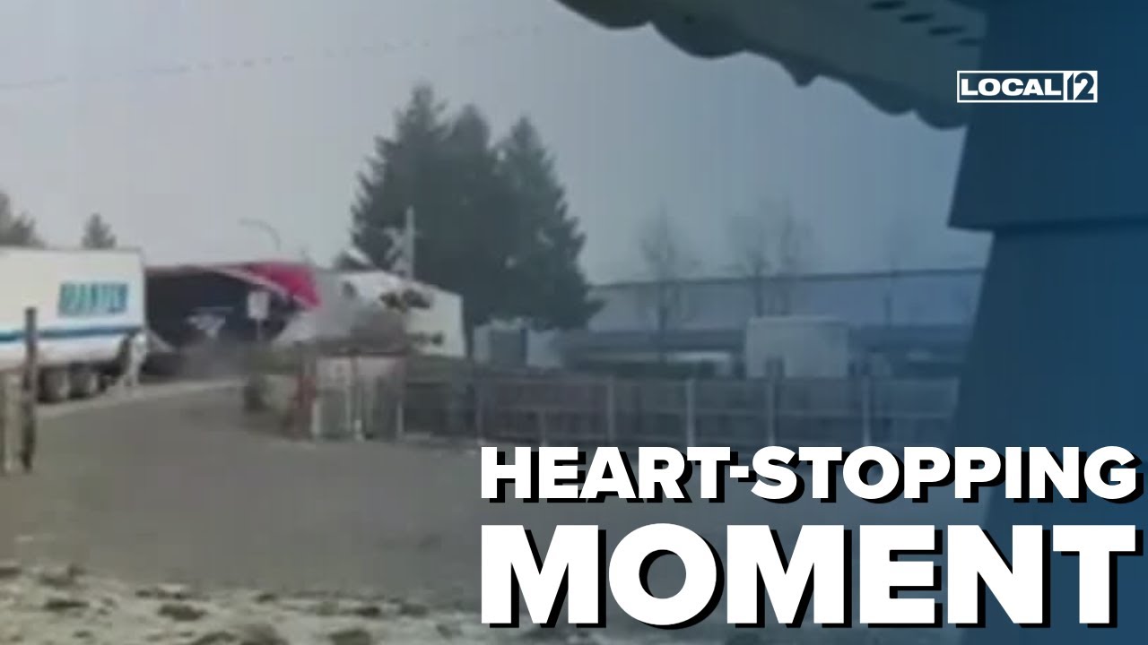 VIDEO: 2 people narrowly escape semi moments before it was destroyed by ...