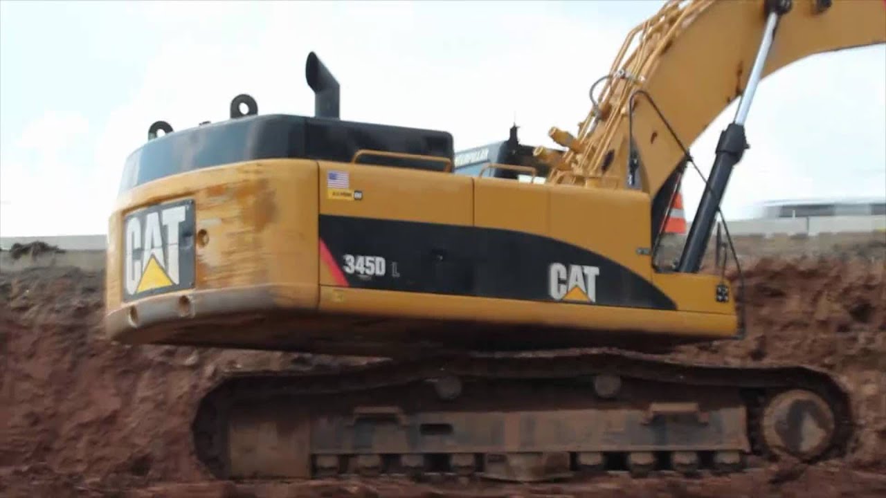 Cat 345DL working - YouTube