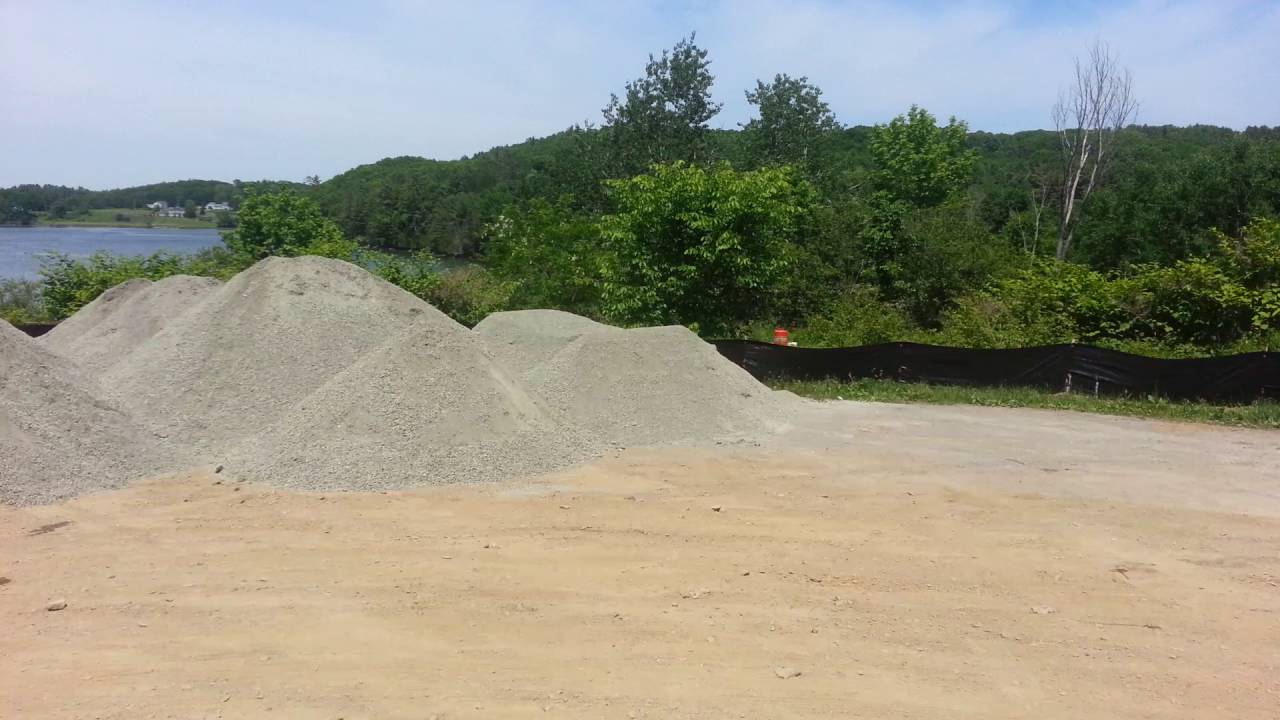 Granite dust for paving rail trail is piling up. - YouTube