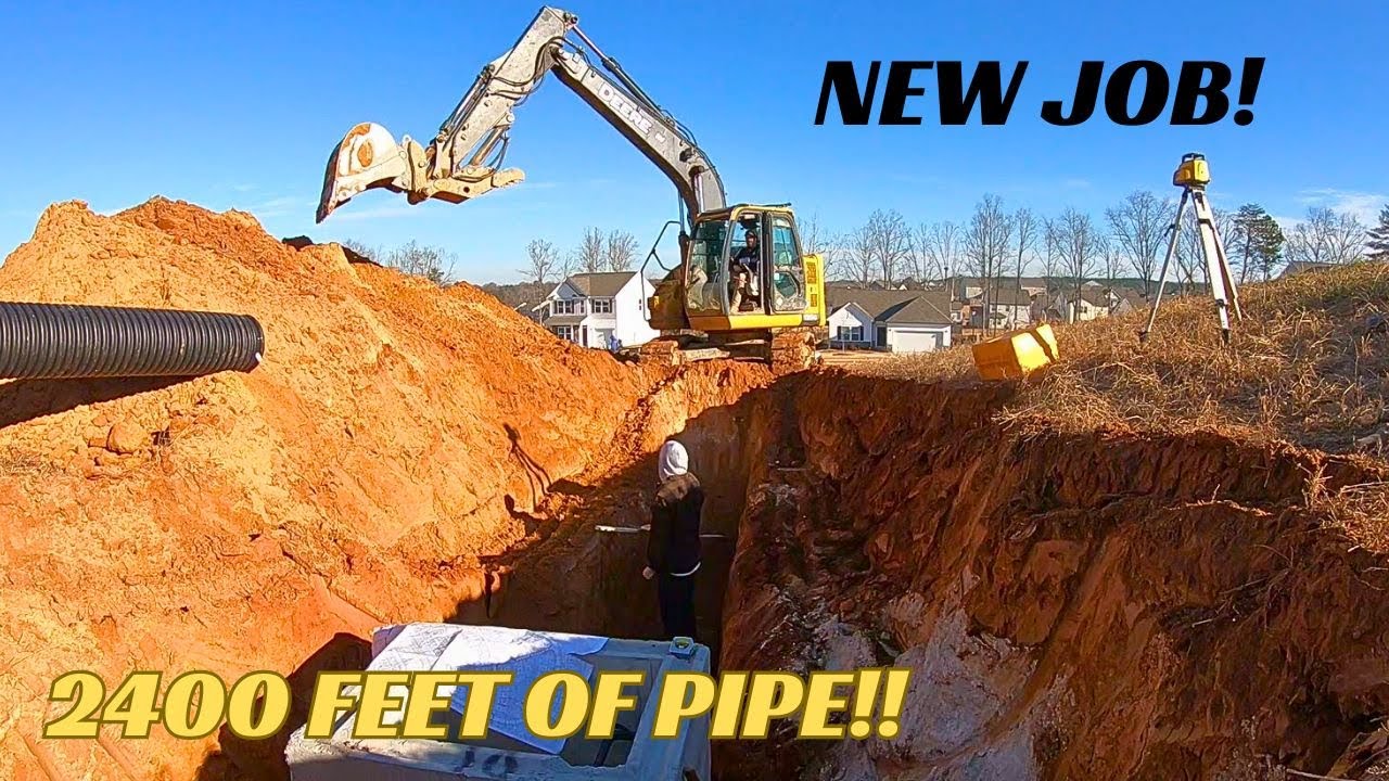 Starting a new pipe job with the John Deere 135G! - YouTube