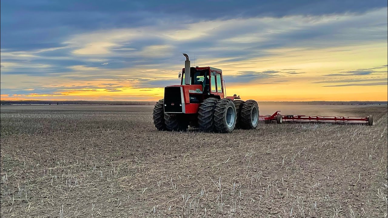 Clearing bushes and harrowing before planting! - YouTube