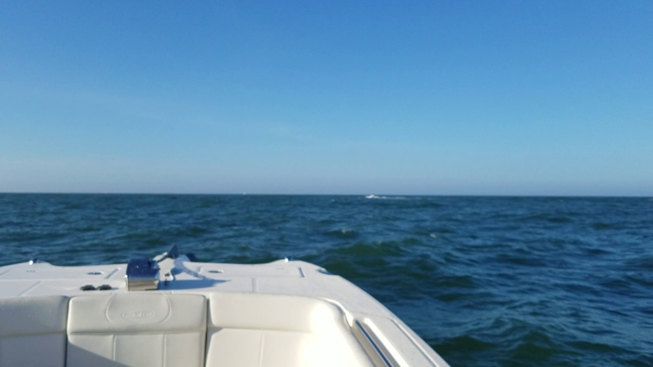 2010 World Cat 290DC in rough water. - YouTube