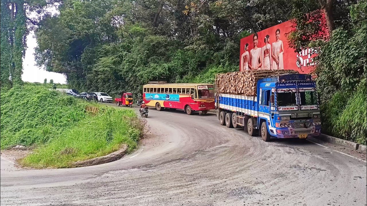 HAEVY LOADED LORRY AND KSRTC BUS TURNING THAMARASSERY GHAT. WAYANAD ...