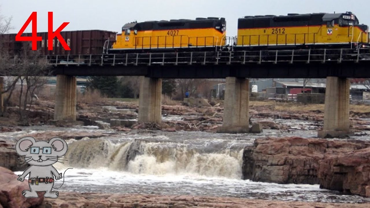 D & I Railroad Train running over Falls Park Sioux Falls, SD in 4K ...
