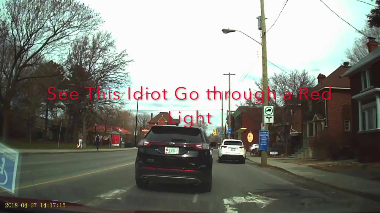 Ford SUV going through red light. - YouTube