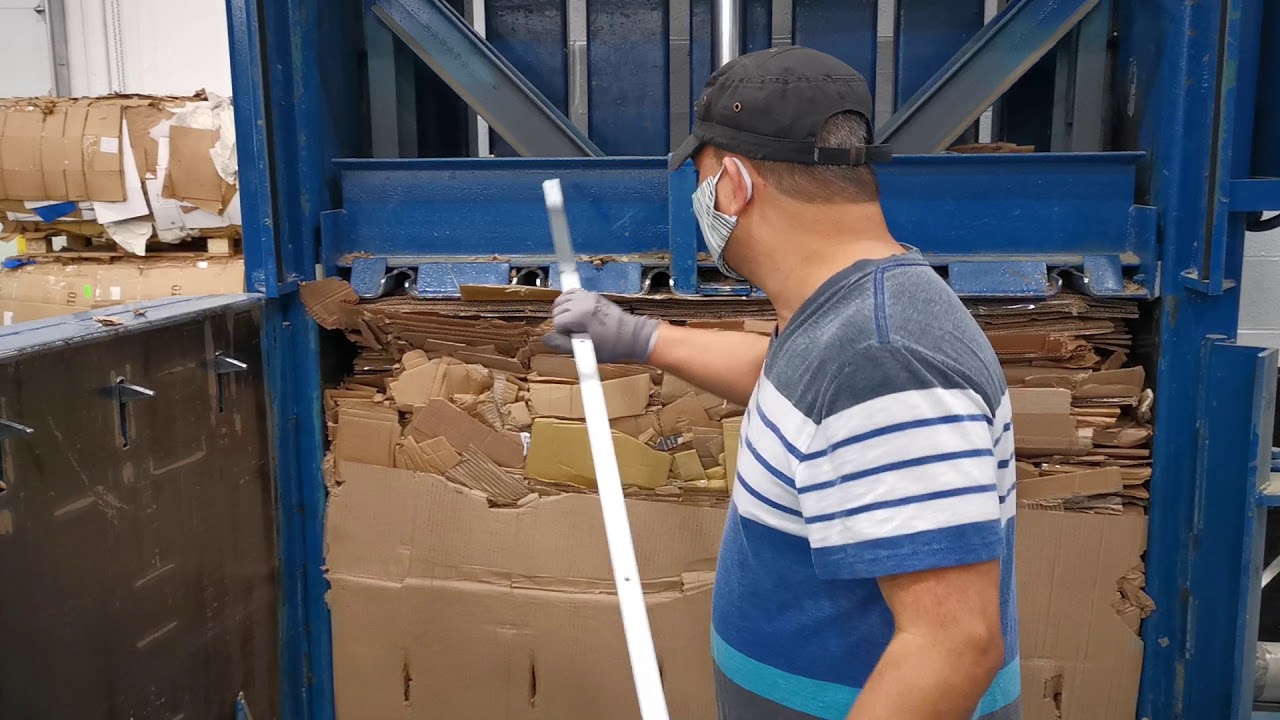 Baler instruction- how to make a bale of cardboard - YouTube