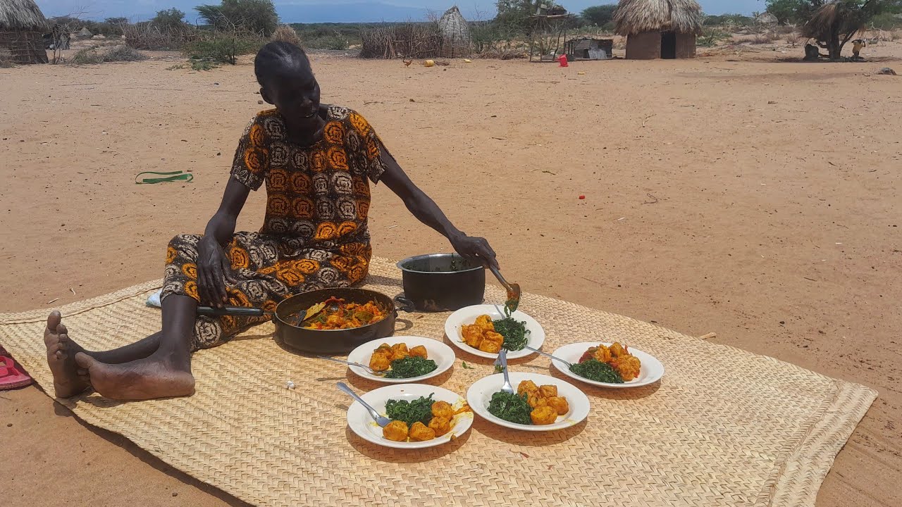 African Traditional village way of cooking wheat and corn flour cuisine ...