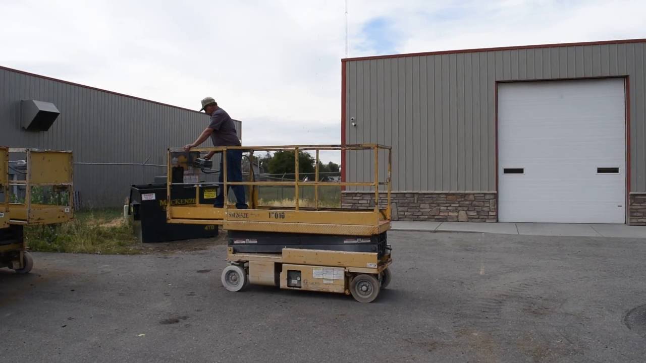 MusserBros Lot #599 - Scissor Lift, Grove SM2632E - YouTube
