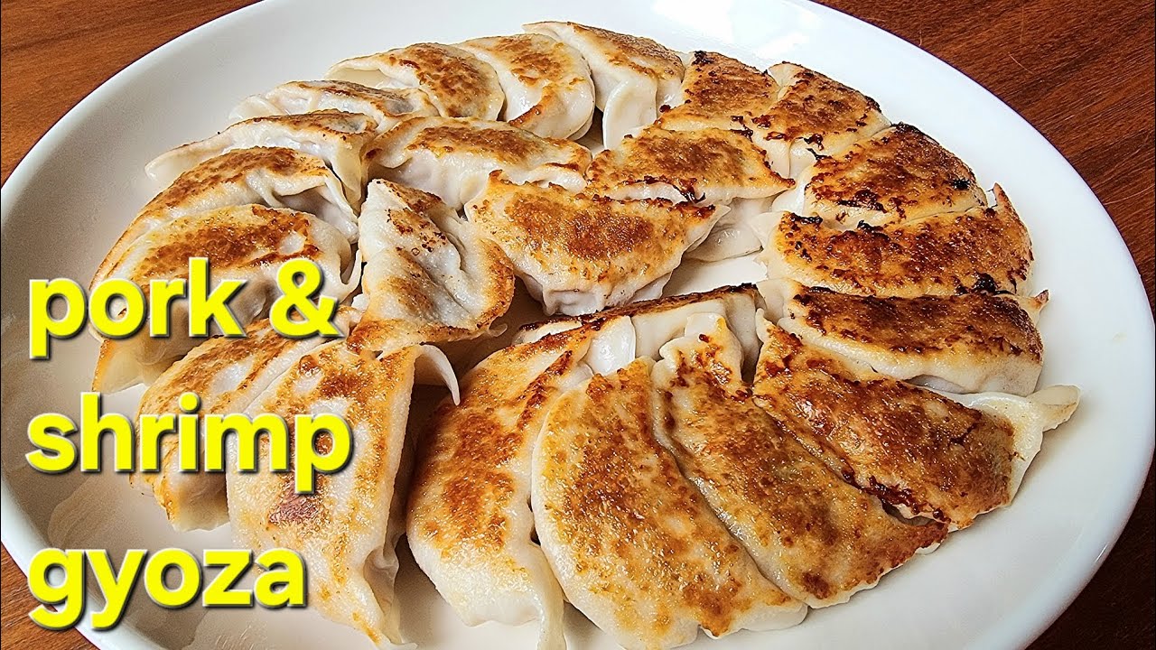Delicious pork & shrimp gyoza with crispy base It's so good it's gone ...
