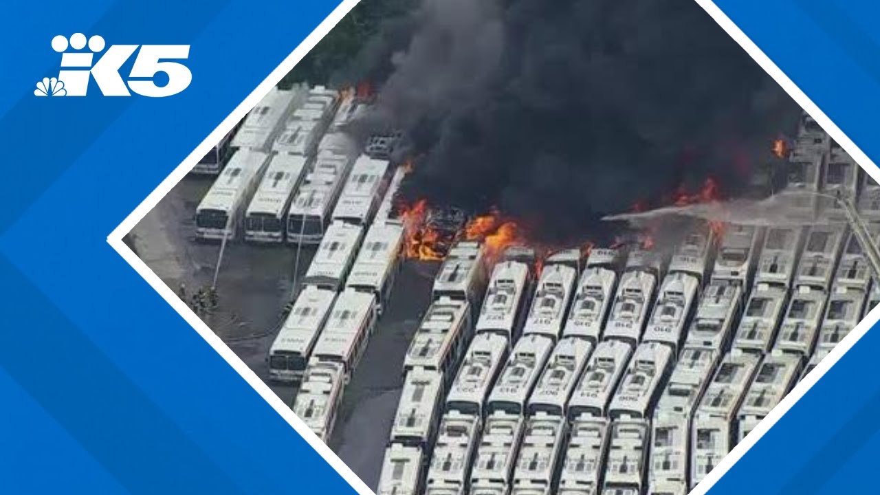 Large fire takes over part of bus depot - YouTube