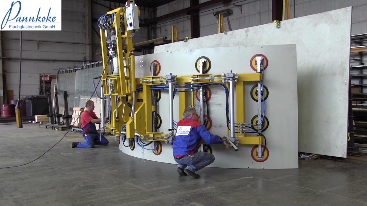How do you move a 6m long, curved glass pane? - YouTube
