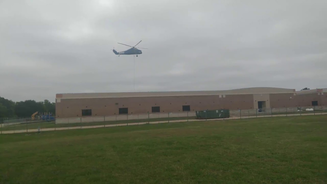 Forest Vista Elementary Fixing Roof by Helicopter - YouTube