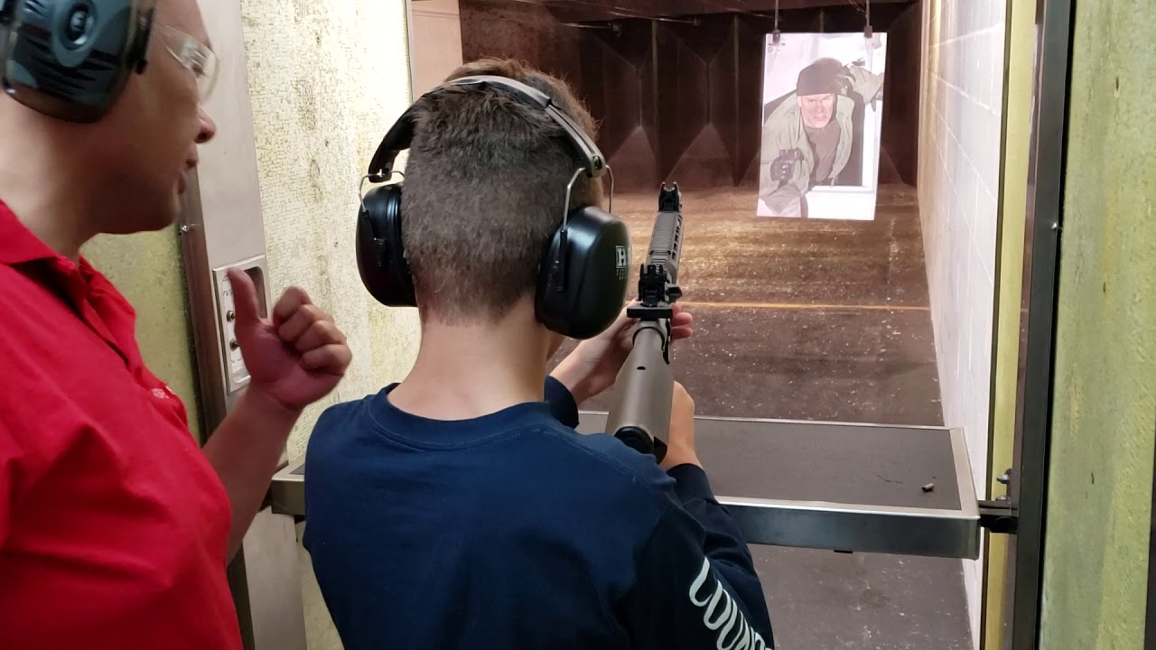 Shooting a 9 millimeter rifle at 808 gun club - YouTube