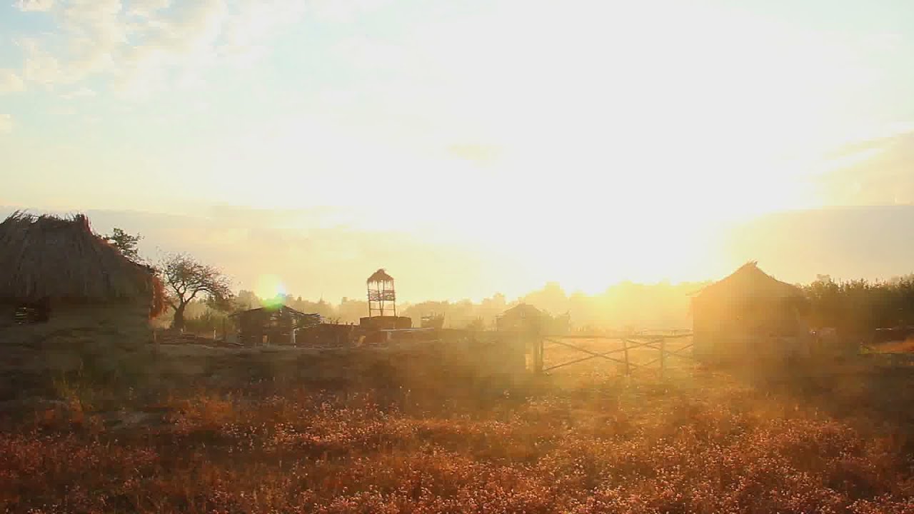 Time-lapse, sky above old farm in countryside. Beautiful sunrise. Stock ...