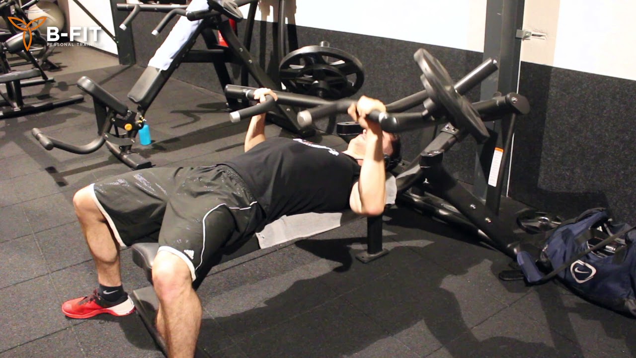 Alternating lying machine chest press - YouTube