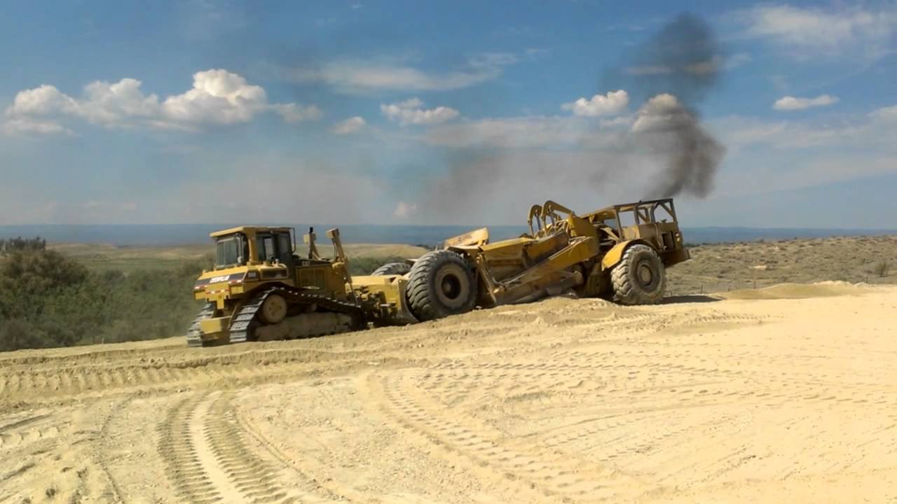 D6 pushing power house scraper - YouTube