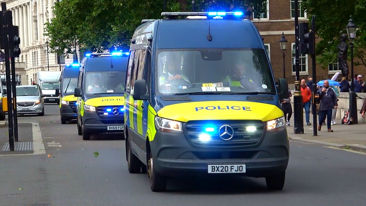 Multiple police vans emergency lights + sirens swarm Westminster in ...
