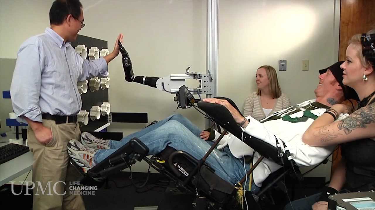 Paralyzed Man Moves Robotic Arm With His Thoughts | UPMC - YouTube