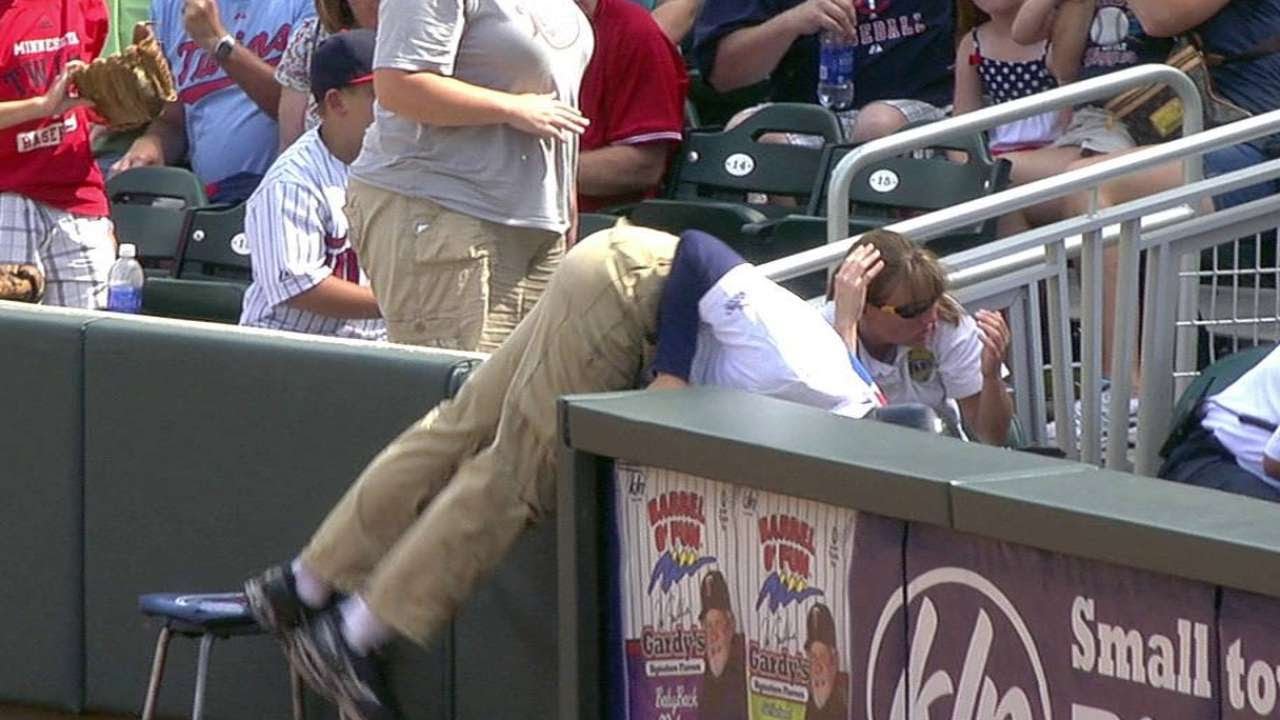 Ballboy tumbles over wall reaching for foul - YouTube
